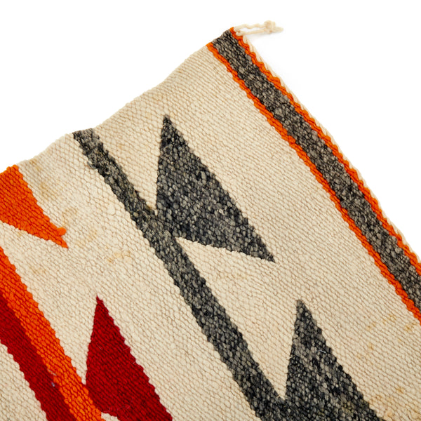 White & Red Aztec Patterned Rug - Gil & Roy Props