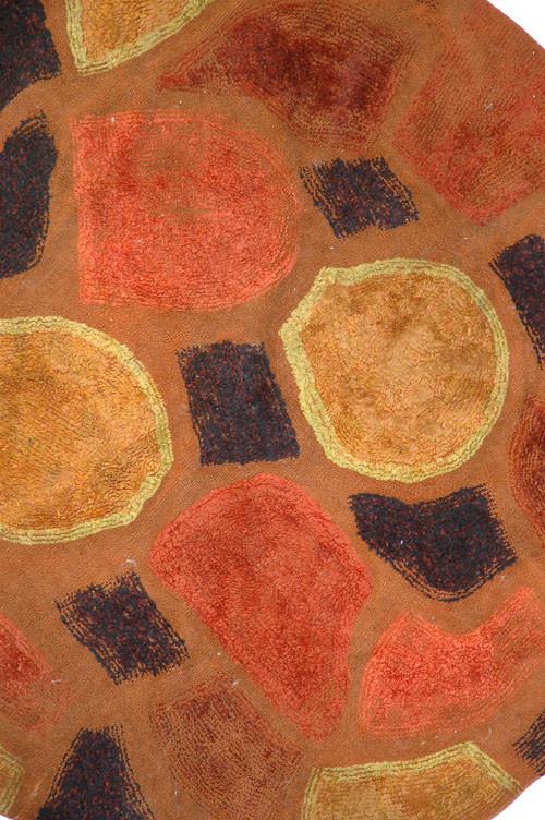 Round Orange Yellow Brown Stepping Stone Rug - Gil & Roy Props